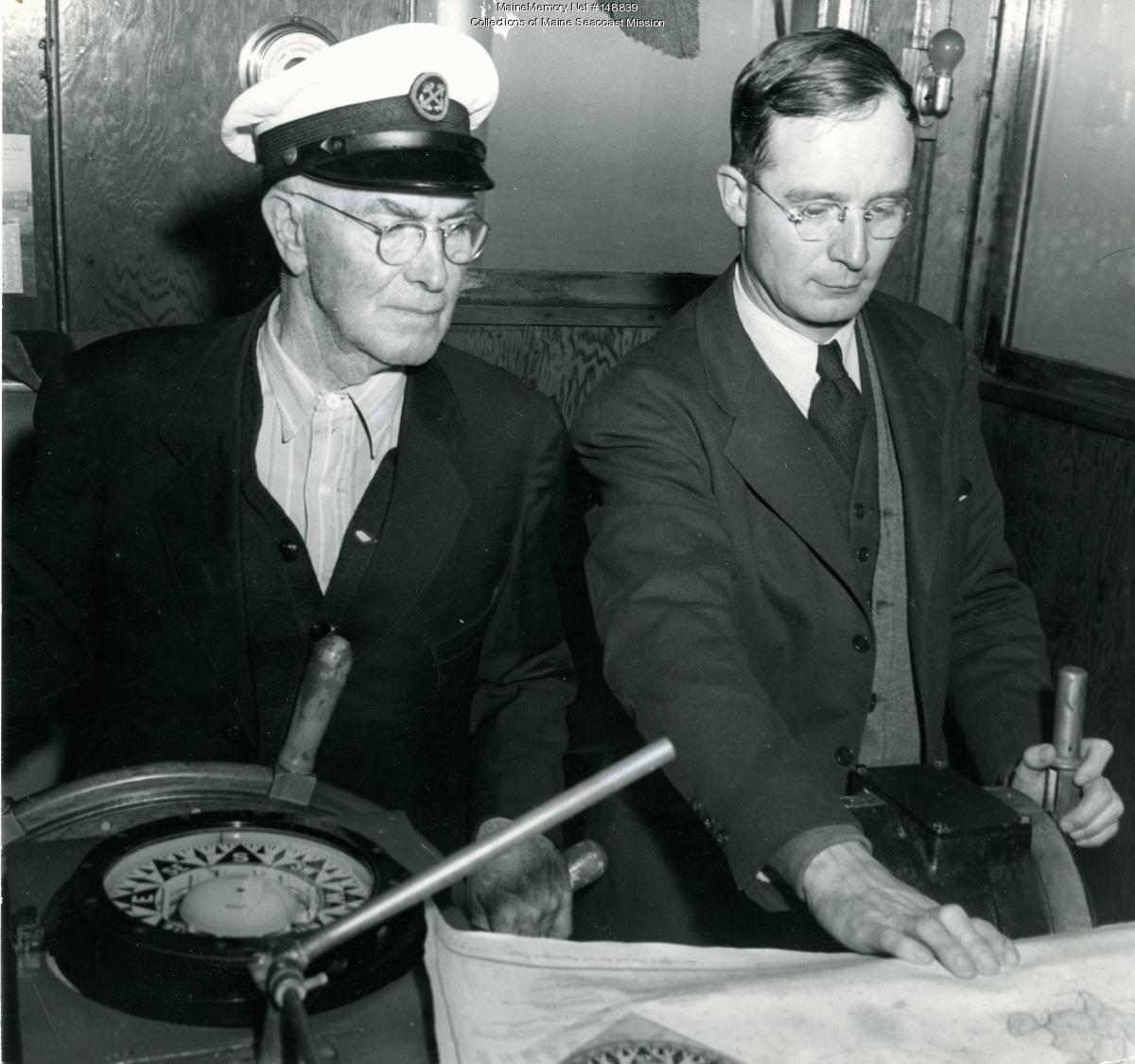 Captain Ralph J. Frye and Reverend Neal D. Bousfield in the wheelhouse ...