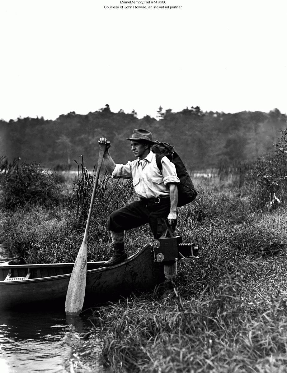 Jack Howard with canoe and camera, 1915 - Maine Memory Network