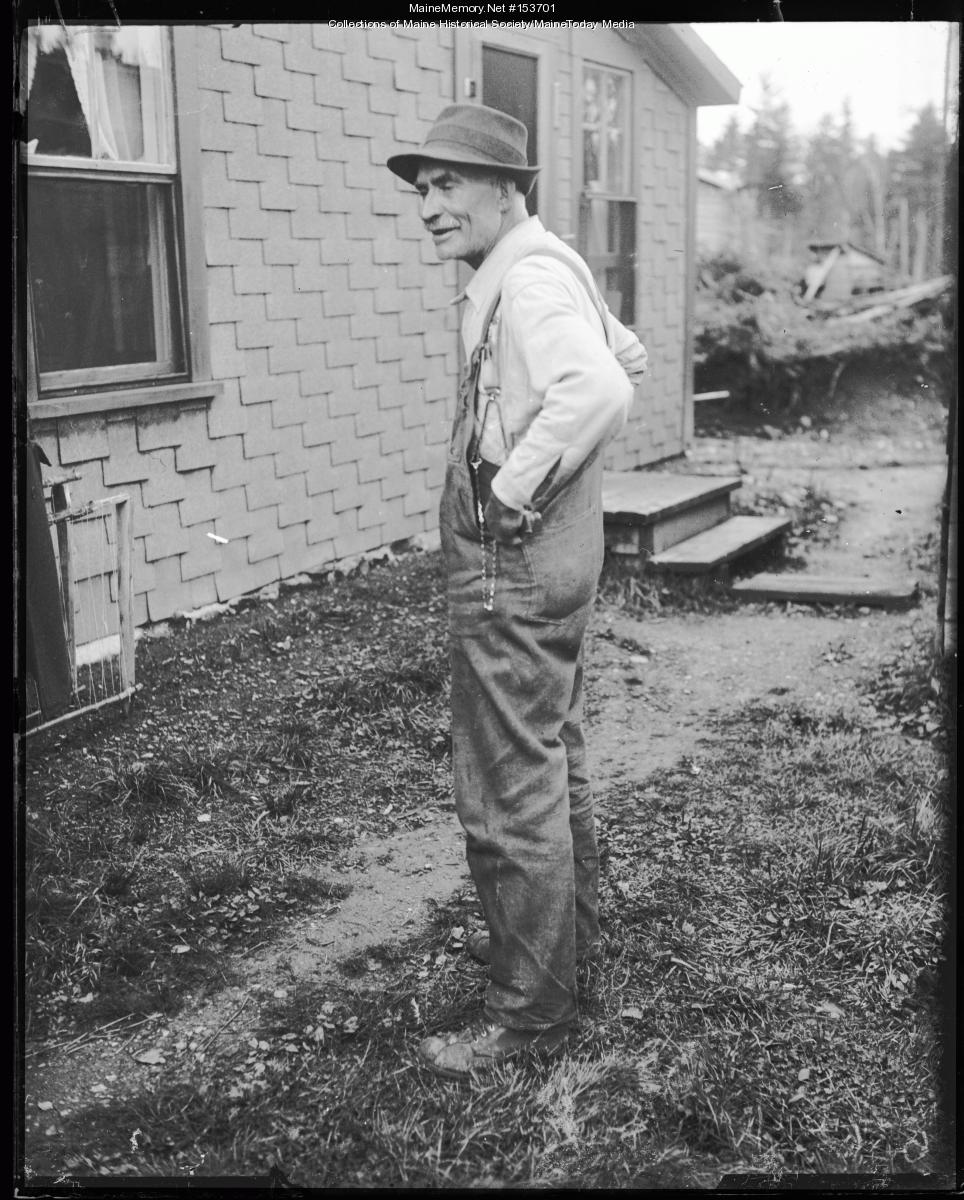 Constable John J. Gendron posing for "Evening Express" photographers ...