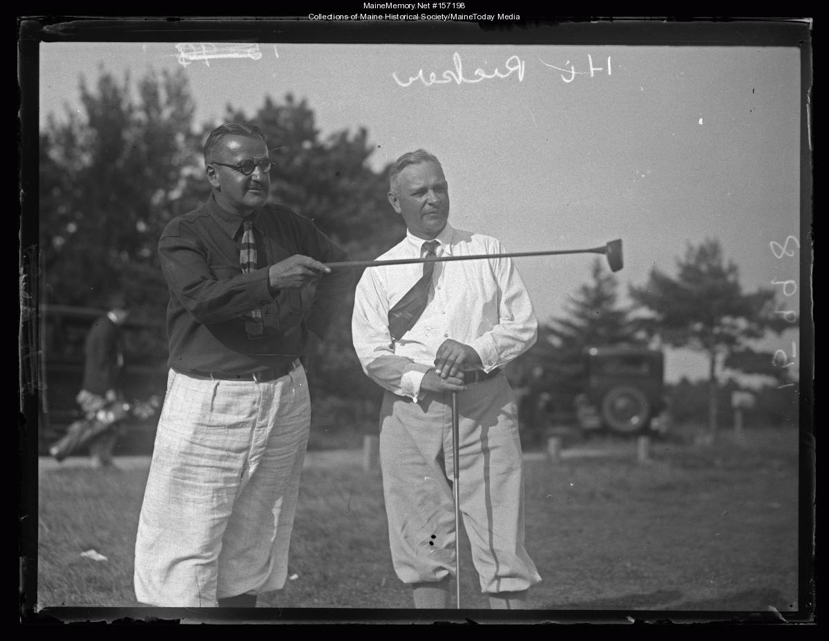 Hiram Ricker Jr. standing with golf club, ca. 1928 - Maine Memory Network