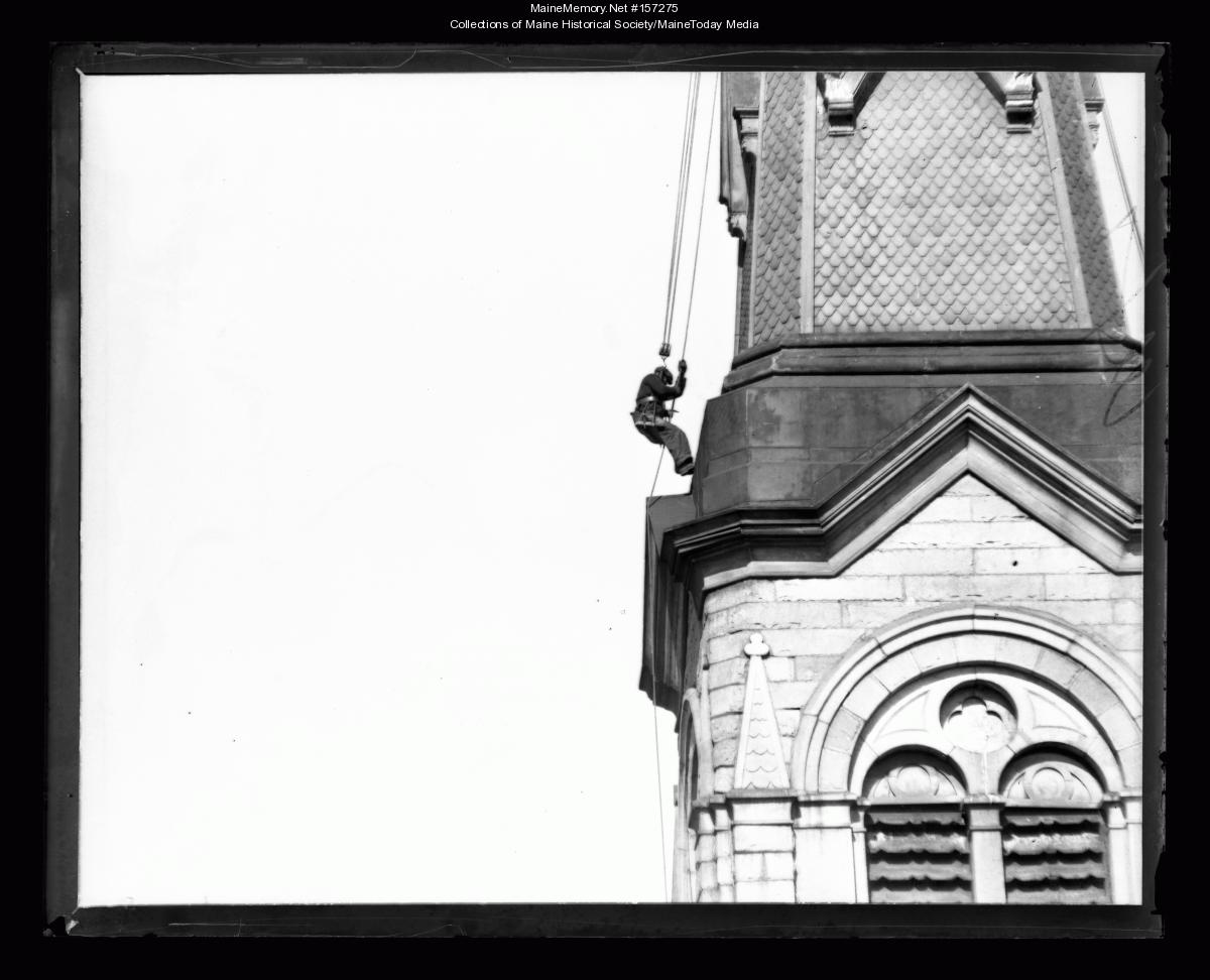 Steeplejack George St. Hillaire on the spire of the Second Parish ...