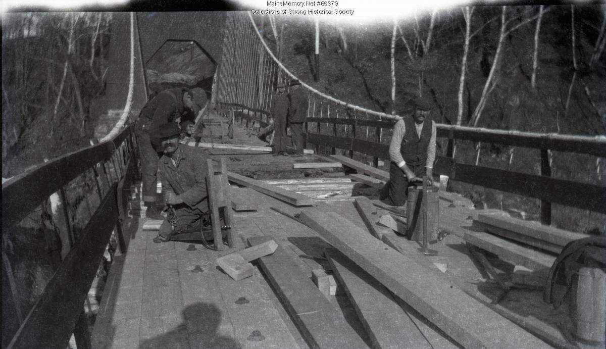 Workers repair damage to suspension bridge, Strong, 1915 - Maine Memory ...